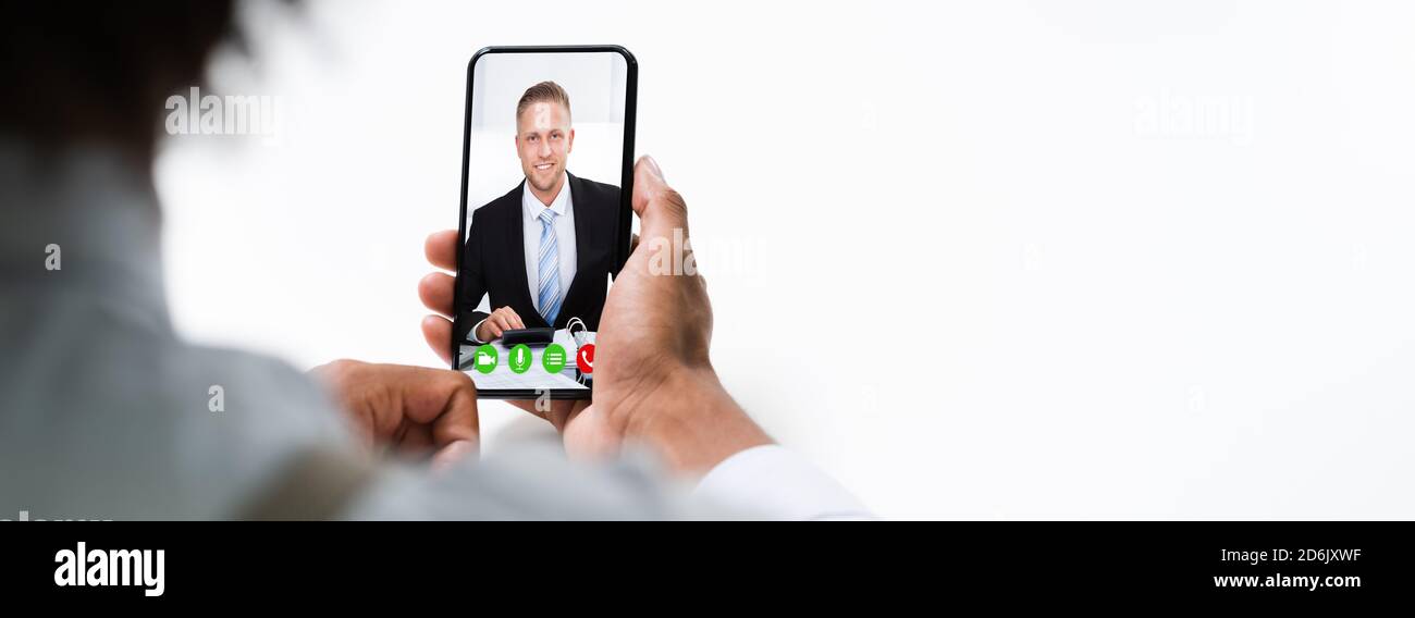 African Man Chatting Using Internet Video Call On Mobile Phone Stock ...