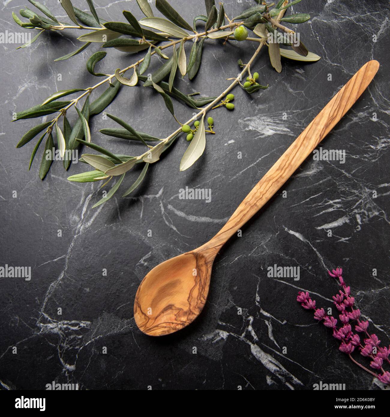 hand crafted wooden spoon in the kitchen Stock Photo - Alamy