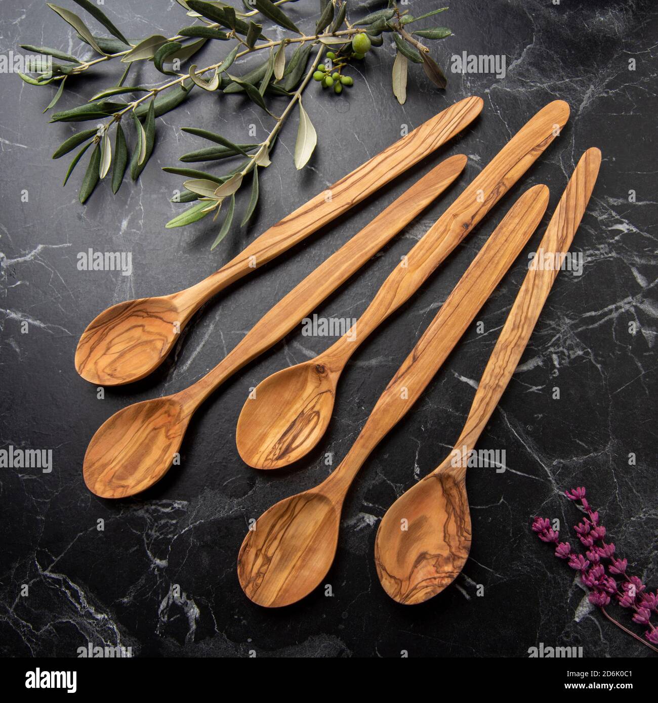 hand crafted wooden spoons in the kitchen Stock Photo - Alamy