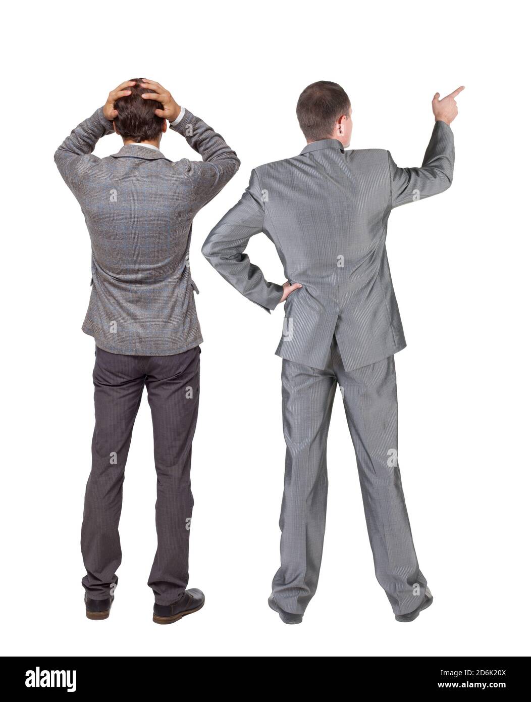 Back view of business man and business woman in suit pointing. Business ...