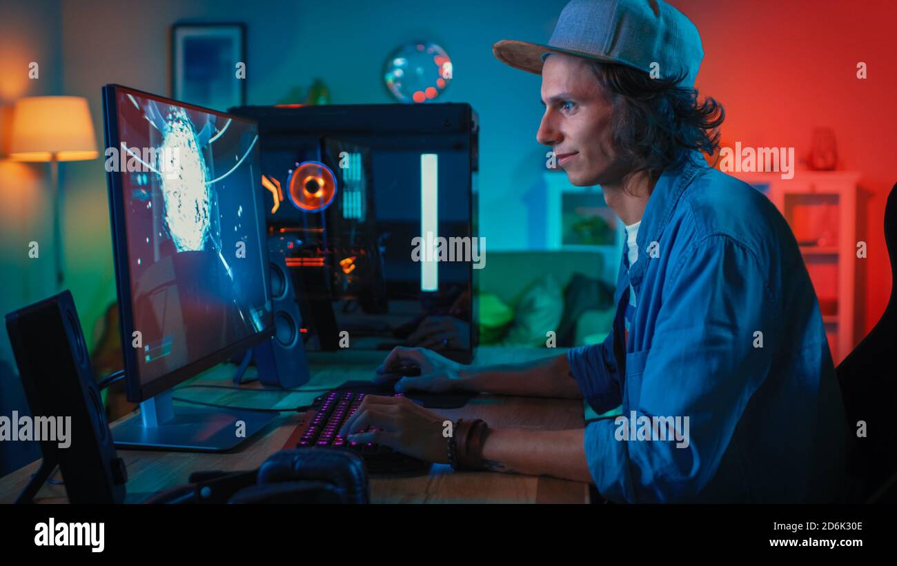 Professional Gamer Playing First-Person Shooter Online Video Game on ...