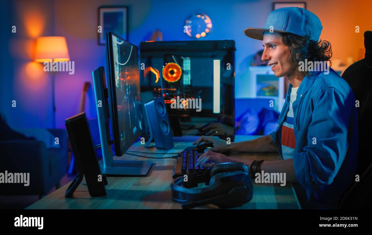 Professional Gamer Playing First-Person Shooter Online Video Game on ...
