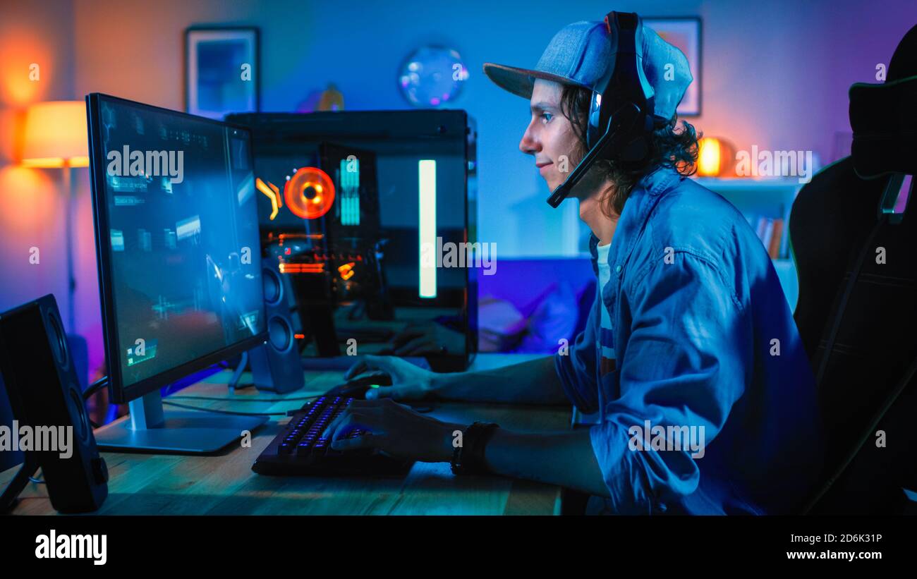 Professional Gamer Playing First-Person Shooter Online Video Game on ...