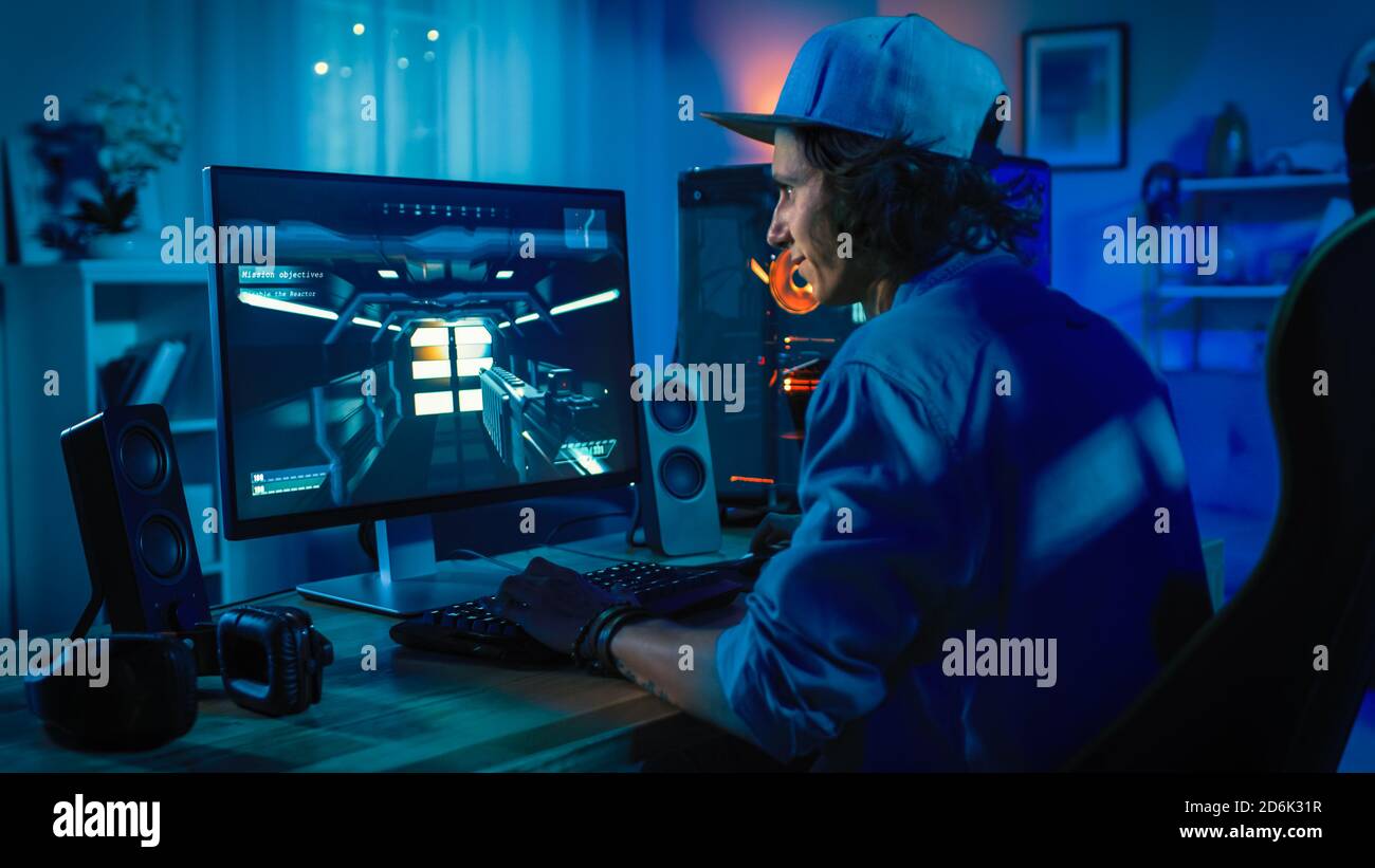 Professional Gamer Playing First-Person Shooter Online Video Game on ...