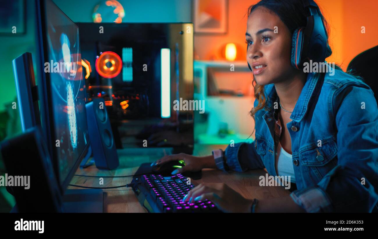 Pretty and Excited Black Blogger Girl in Headphones is Playing First ...