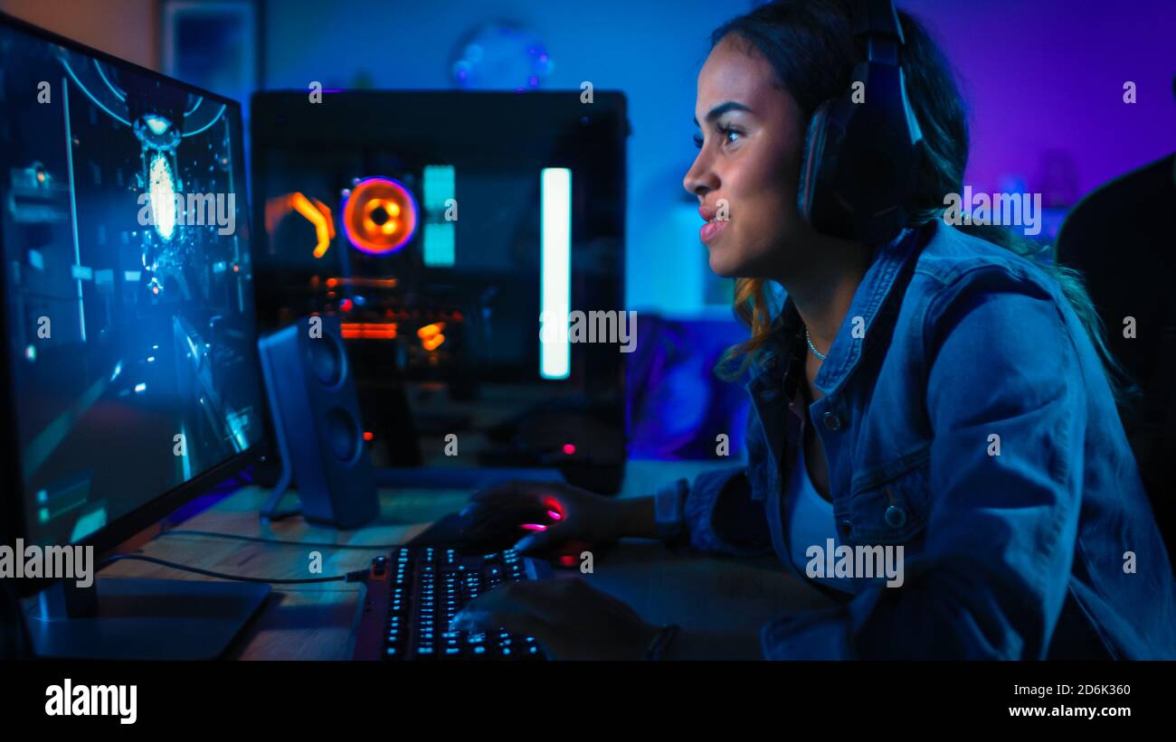 Pretty and Excited Black Gamer Girl in Headphones is Playing First ...