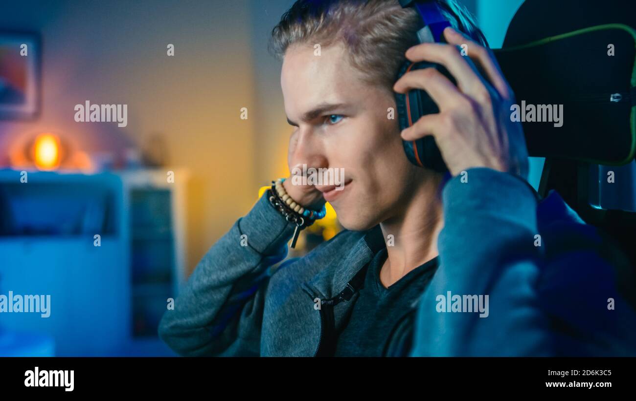 Gamer Puts His Headset with a Mic On and Starts Playing Shooter Online ...