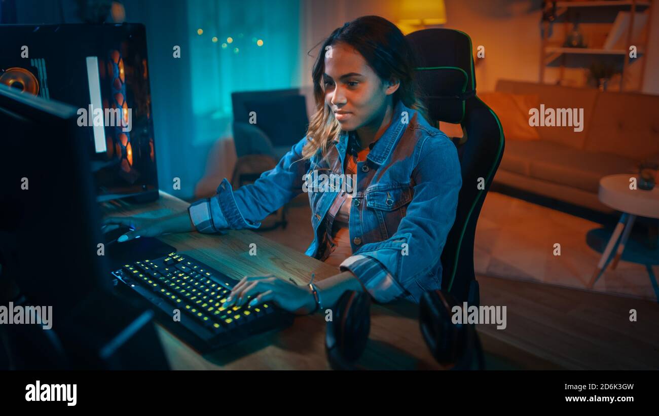 Excited and Pretty Black Gamer Girl is Playing Online Video Game on Her ...