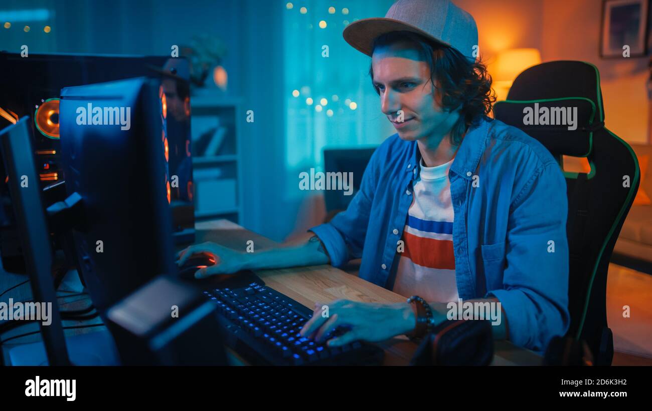 Excited Gamer in Cap Playing Online Video Game on His Personal Computer ...