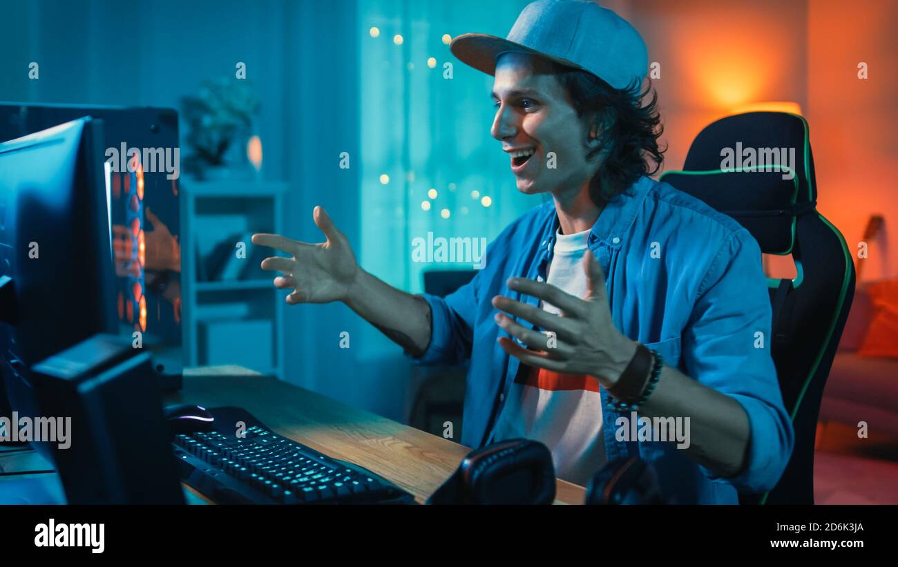 Handsome Surprised and Excited Young Man Watching an Action Video on a ...