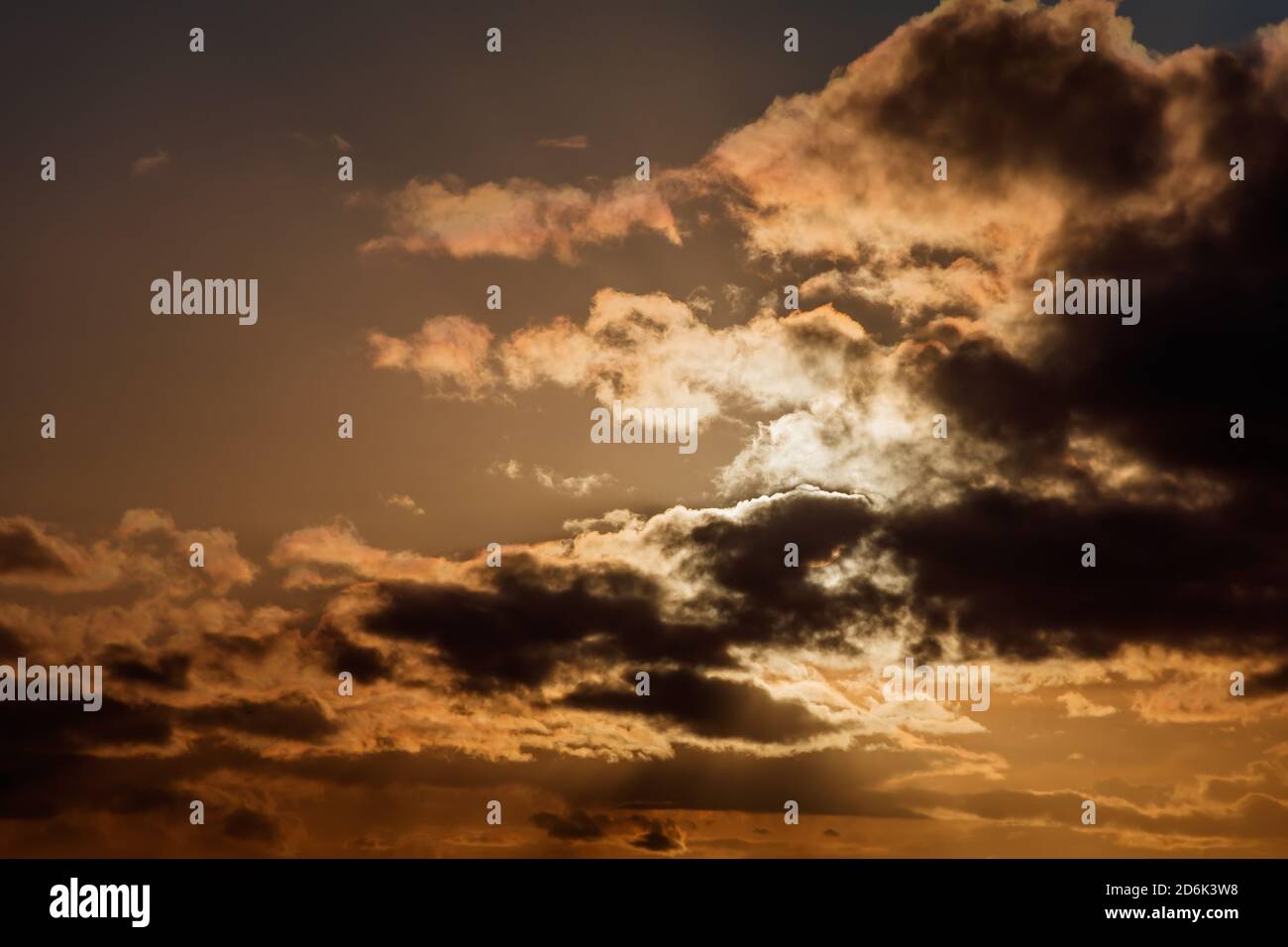The disappeared behind some cloud cover Stock Photo - Alamy