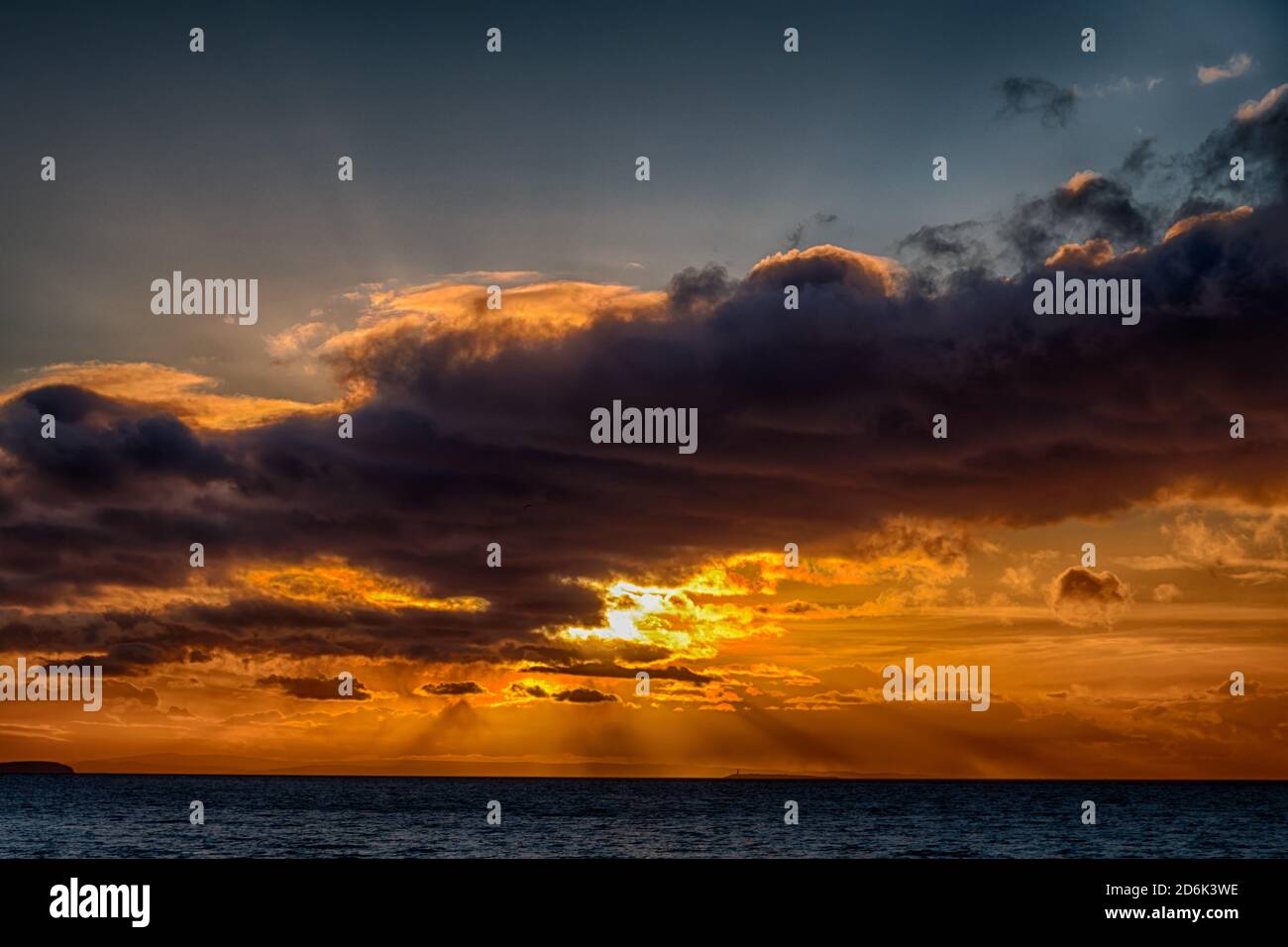 The disappeared behind some cloud cover Stock Photo - Alamy