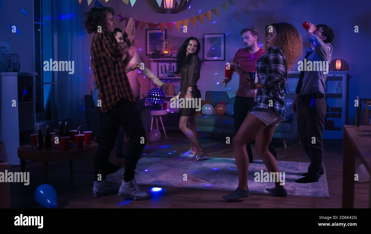 At the College House Party: Diverse Group of Friends Have Fun, Dancing ...