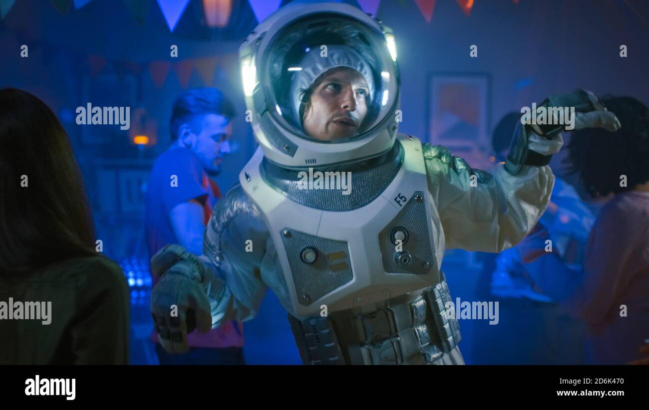 At the College House Costume Party: Fun Guy Wearing Space Suit Dances ...