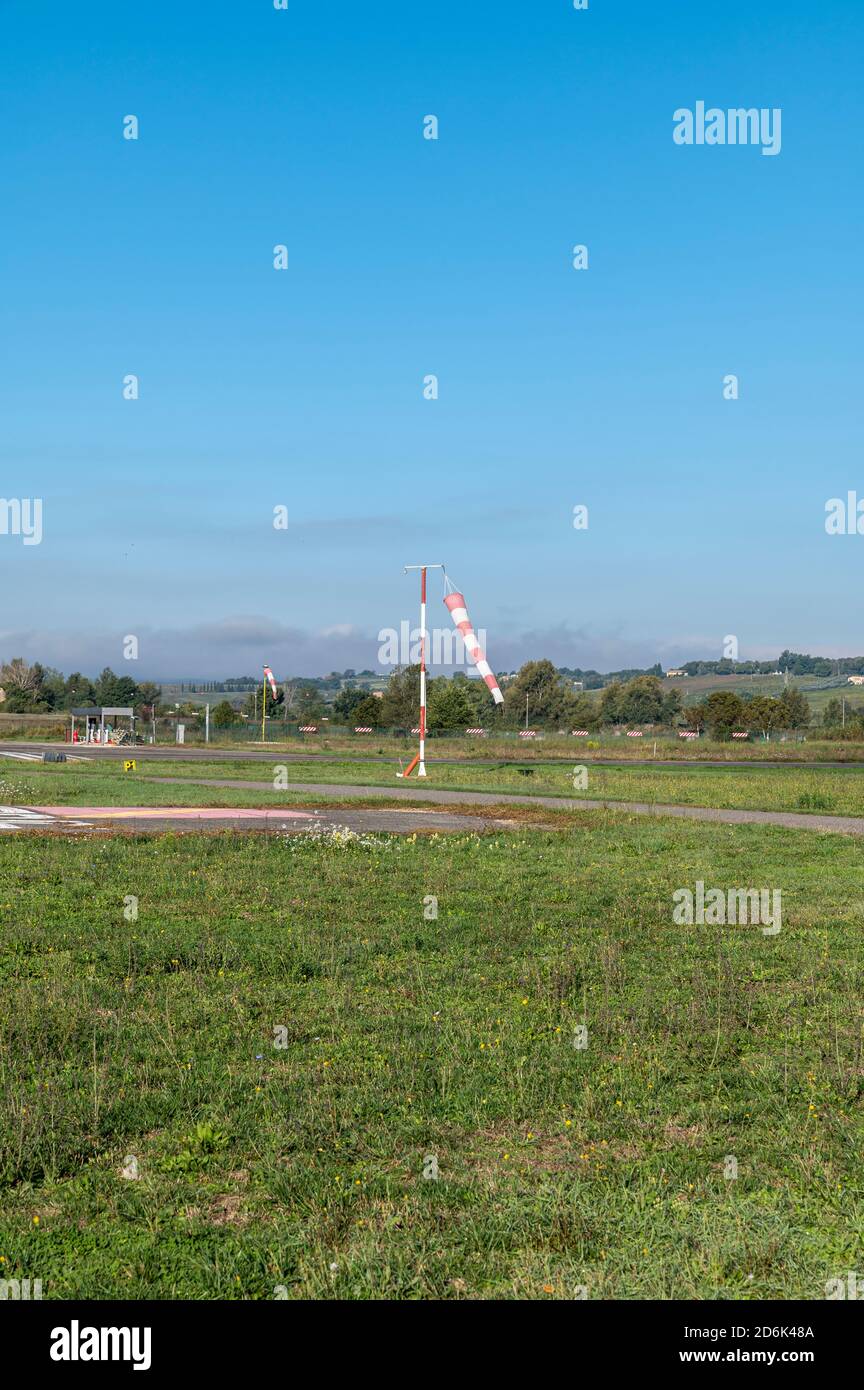 wind indicator for airport near pist on a sunny day Stock Photo - Alamy