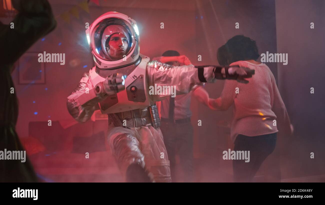 At the College House Costume Party: Fun Guy Wearing Space Suit Dances ...