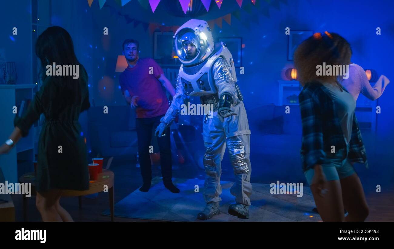 At the College House Costume Party: Fun Guy Wearing Space Suit Dances ...