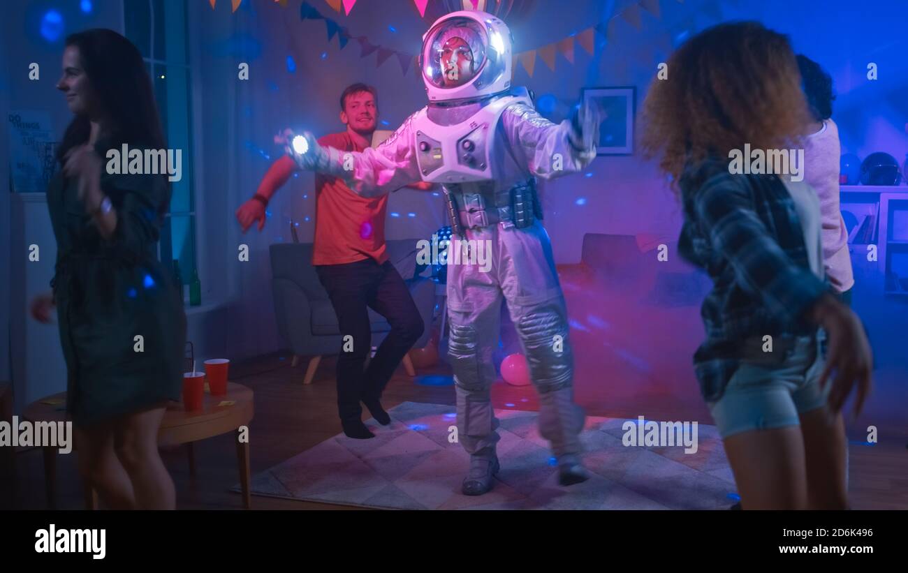 At the College House Costume Party: Fun Guy Wearing Space Suit Dances ...