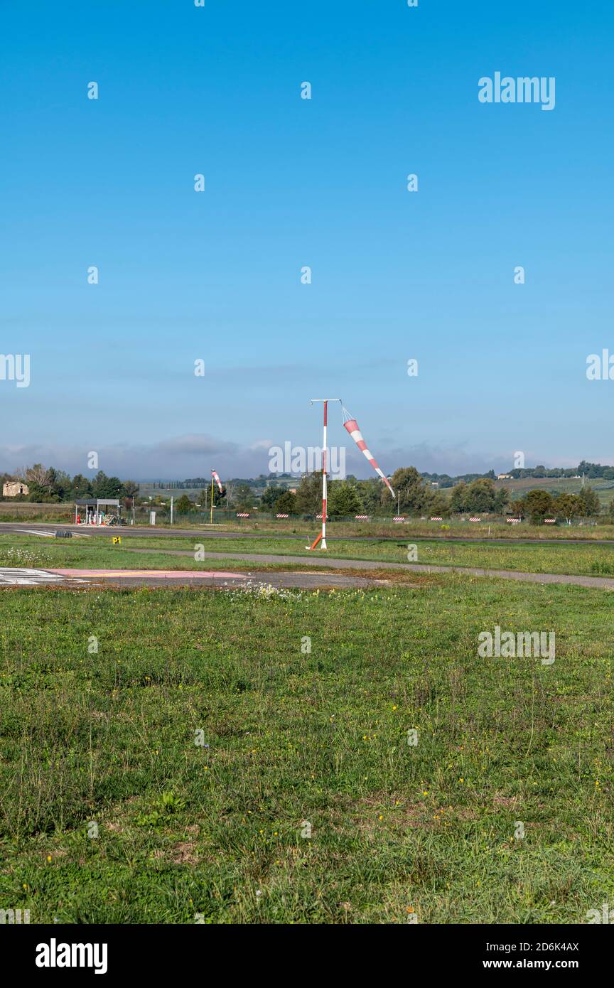 wind indicator for airport near pist on a sunny day Stock Photo - Alamy