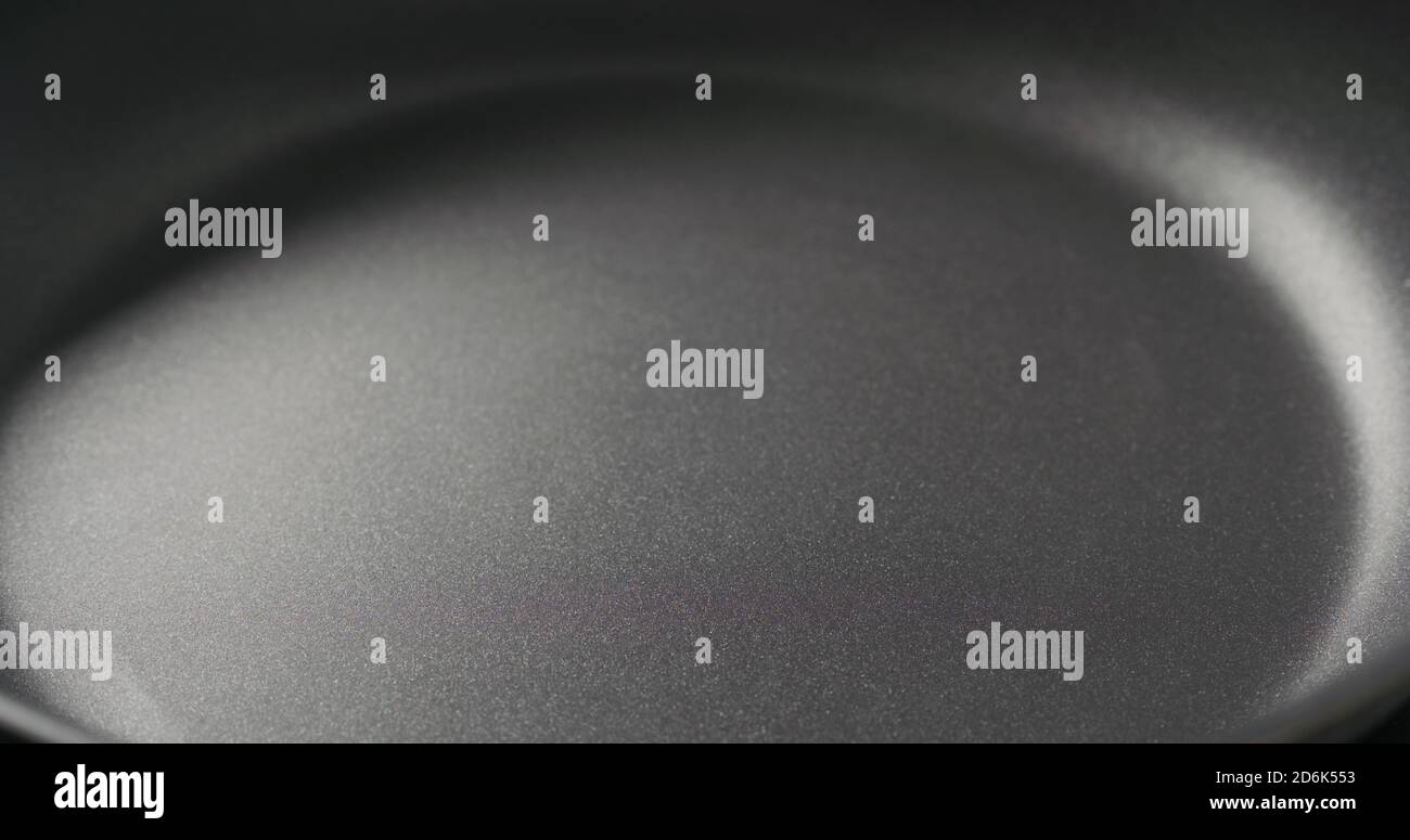Empty non stick pan surface closeup, wide photo Stock Photo - Alamy