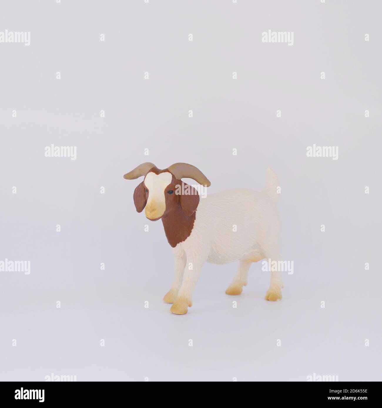 small goat toy model plastic isolated in white background Stock Photo ...