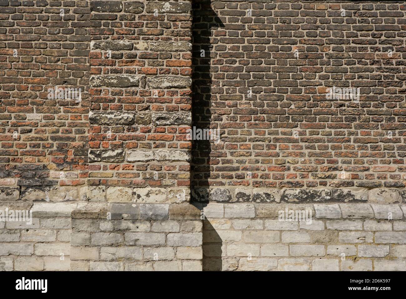 crumbling Church wall of red brick with plaster Stock Photo - Alamy