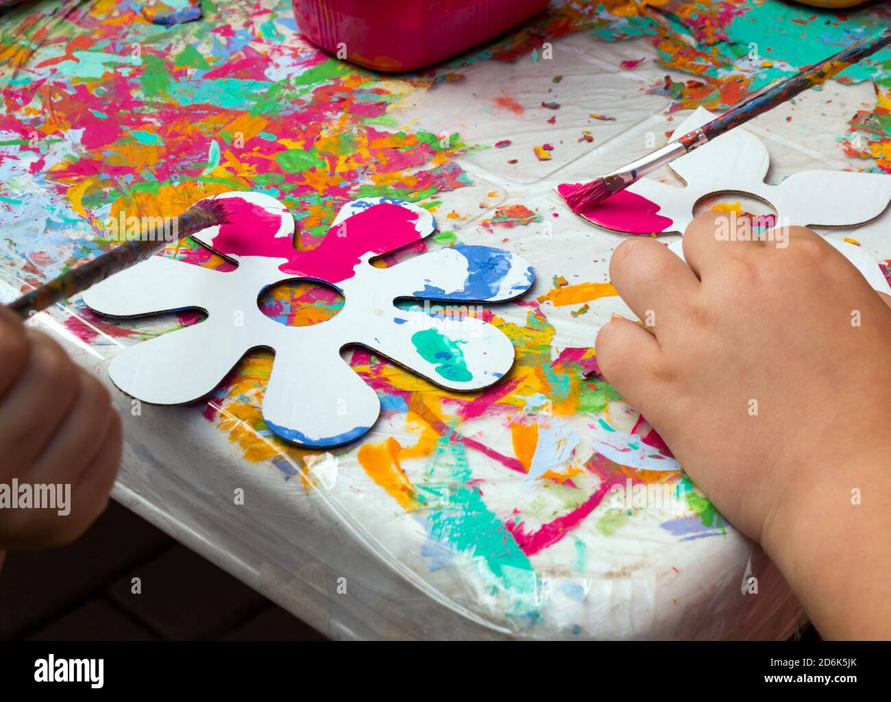 Children paint applique elements with water colors Stock Photo - Alamy