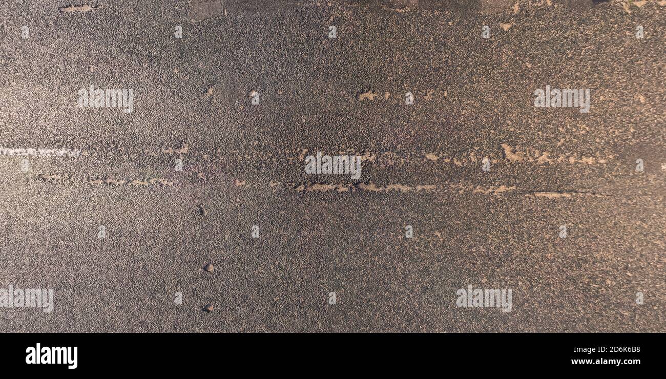 view from above on texture of old asphalt road Stock Photo - Alamy