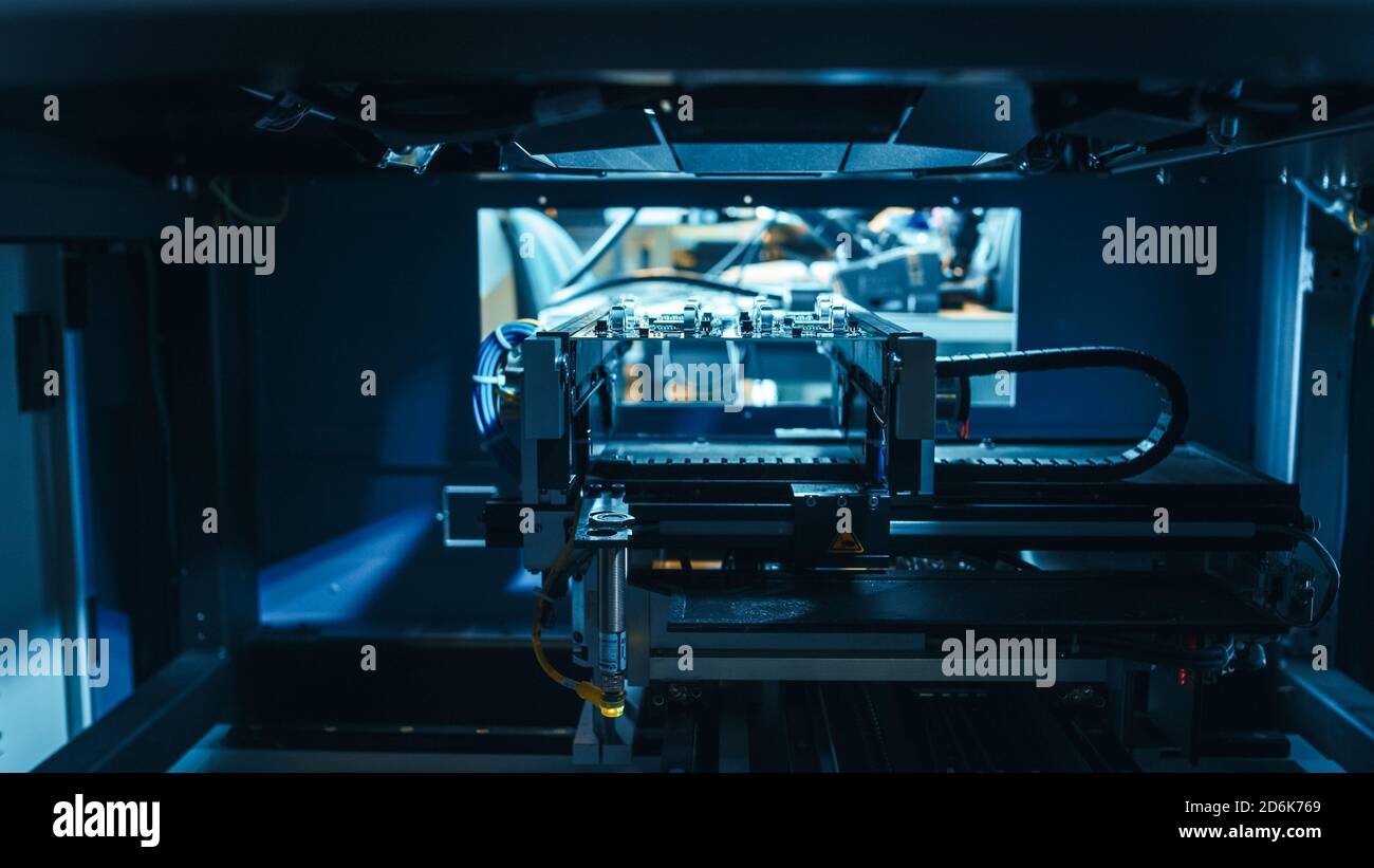 Automated Robotic Industrial Equipment is Testing Electronic Printed ...