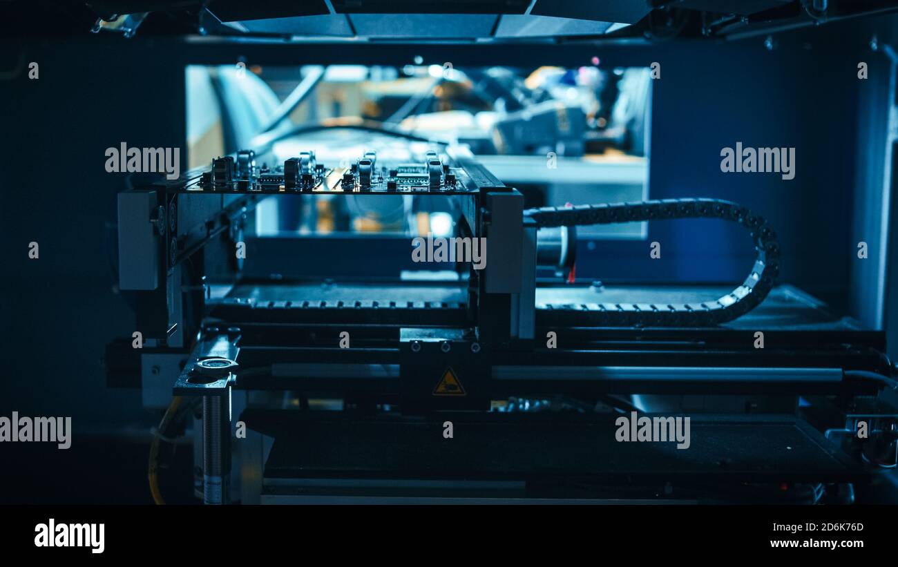 Automated Robotic Industrial Equipment is Testing Electronic Printed ...