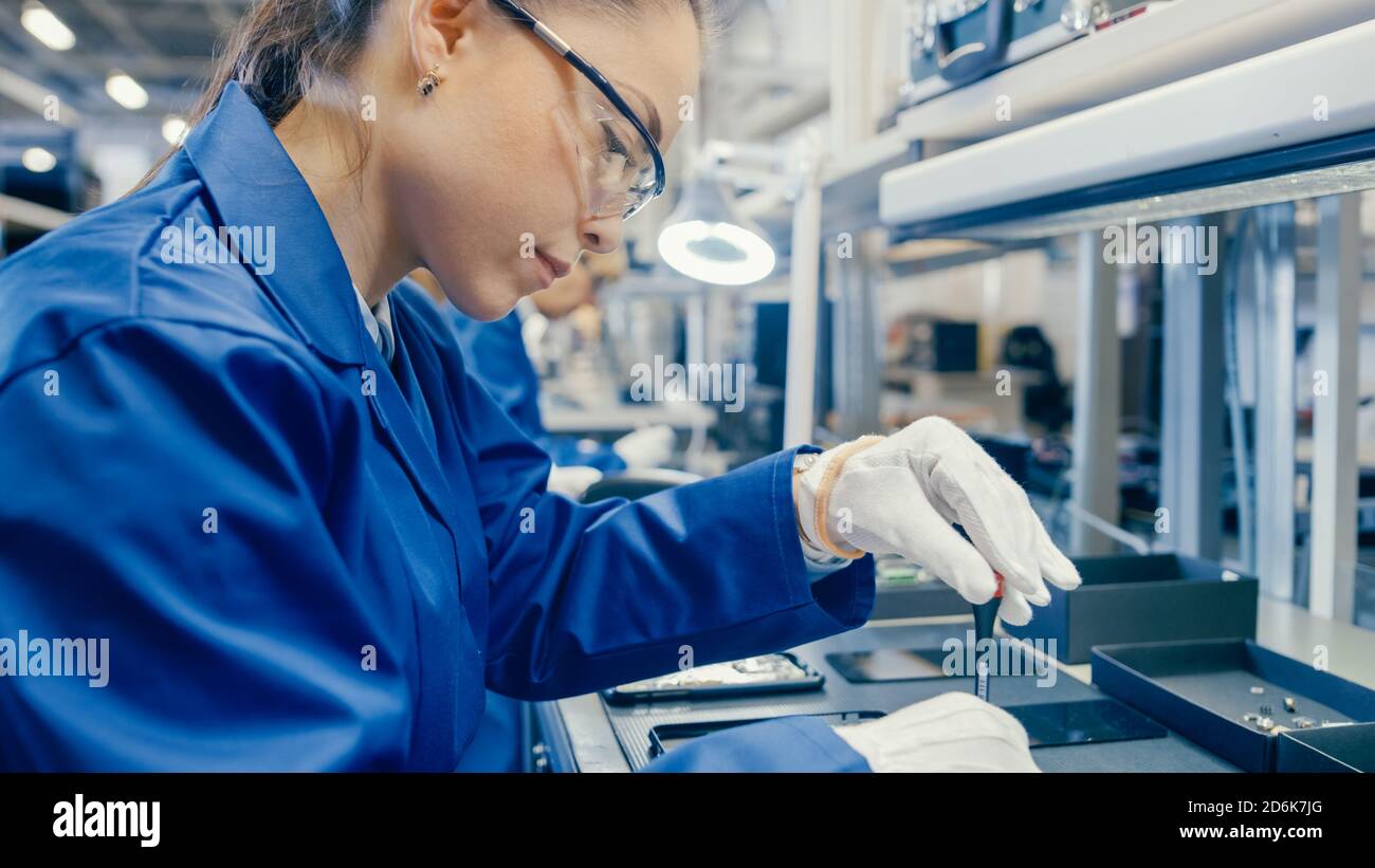 Woman Electronics Factory Worker in Blue Work Coat and Protective ...