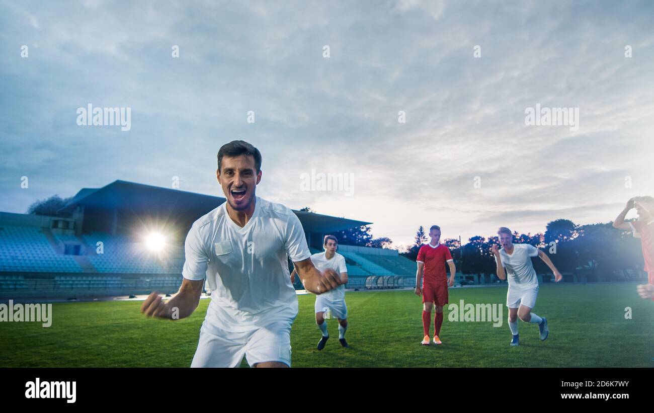 Portrait Shot of Captain of the Soccer Team Celebrates Awesome Victory ...