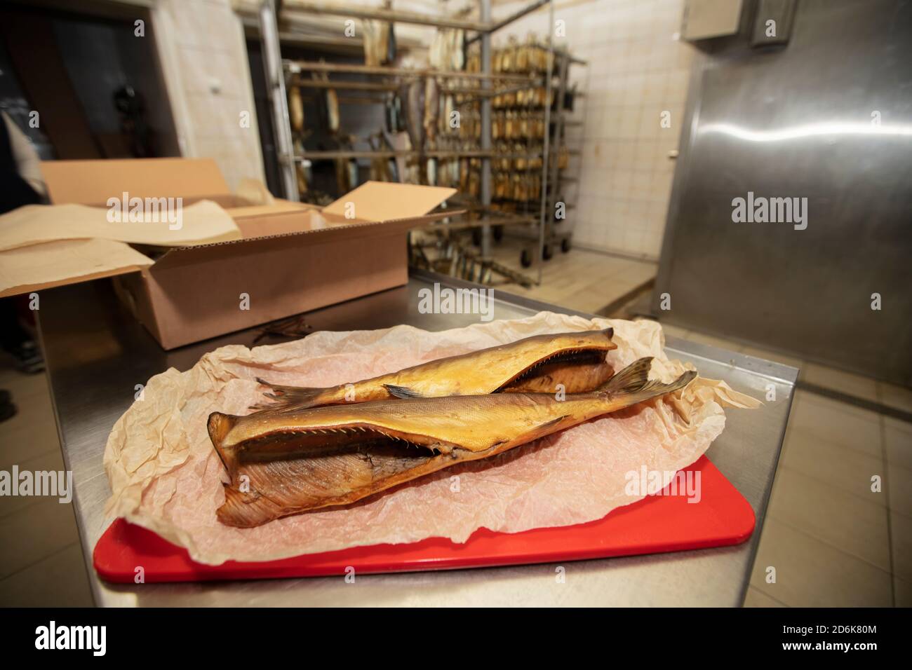 Industrial production of smoked fish. Fish factory Stock Photo - Alamy