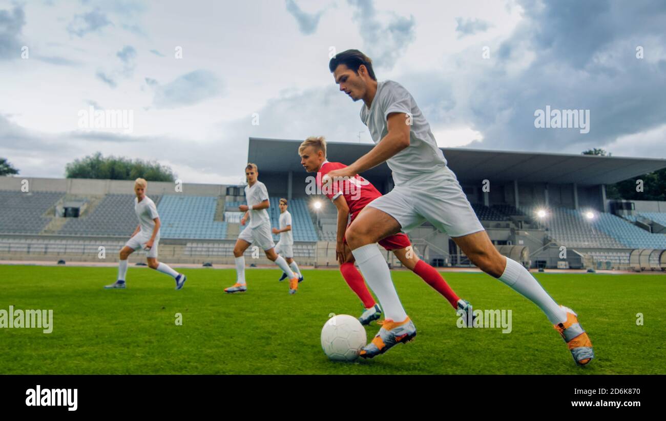 Professional Soccer Player Leads with a Ball, Masterfully Dribbling and ...