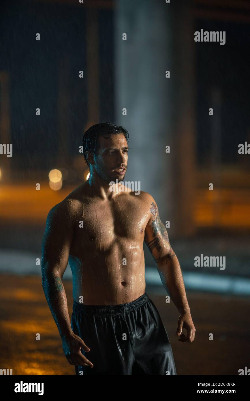 Shirtless Athletic Muscular Young Man is Finishing His Sport Trainig on ...