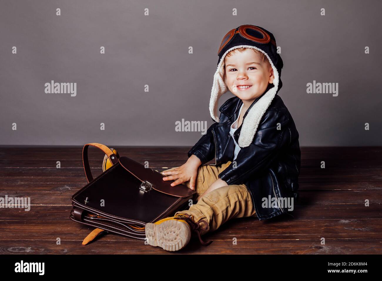 Portrait of a beautiful little boy in a plane pilot costume Stock Photo ...