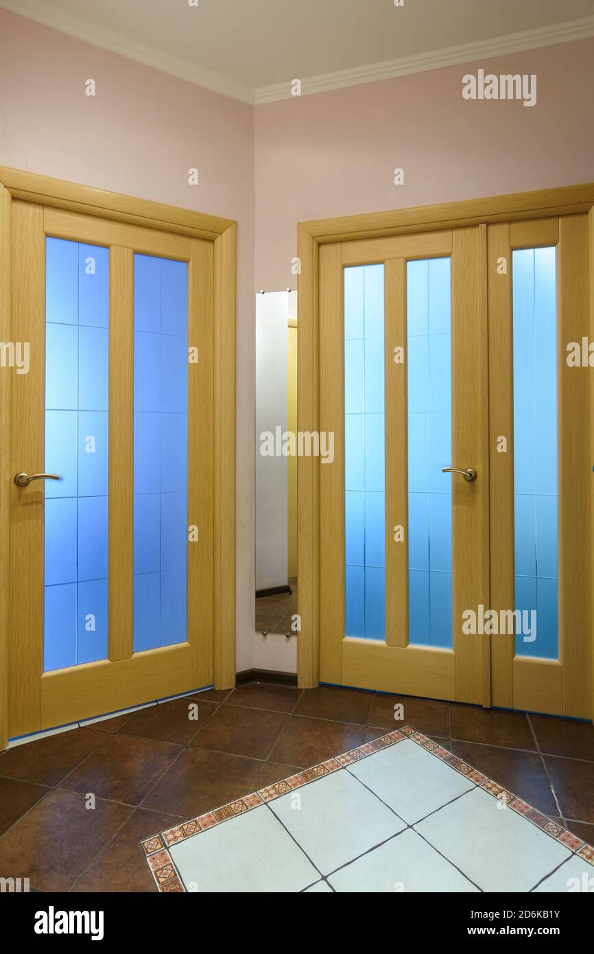 Closed glass interior doors, view from the corridor Stock Photo - Alamy