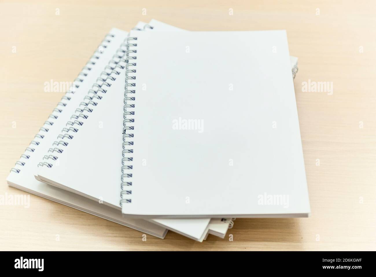 Stack of white notepads on the conference table Stock Photo - Alamy