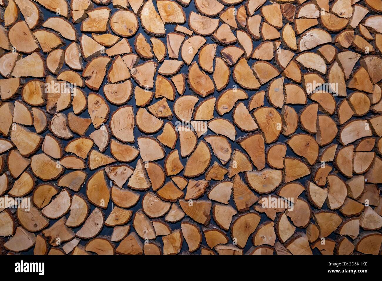 Wall decor made of wood pieces. Wood texture from logs Stock Photo - Alamy