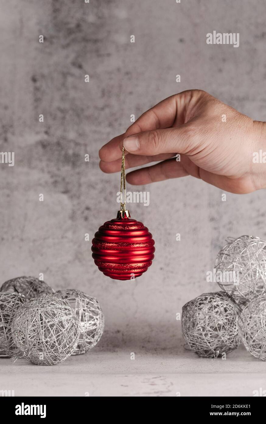 Shiny red ball on hand hi-res stock photography and images - Alamy