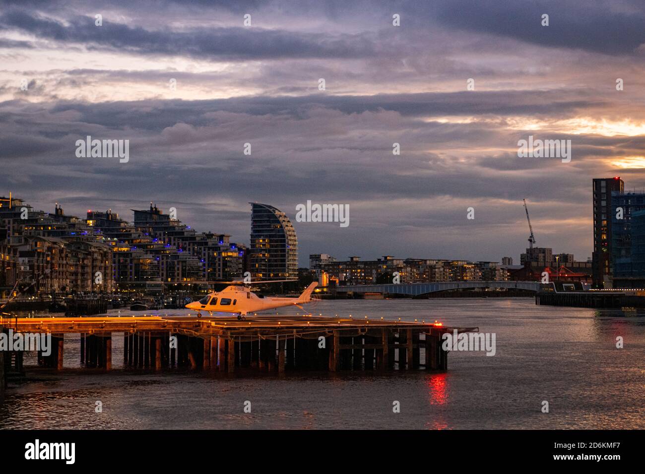 A helicopter comes in to land at the London Heliport in Battersea Stock ...