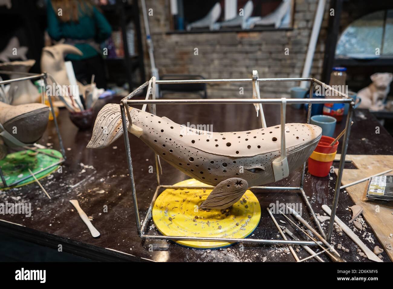 Clay whale on a stand in a pottery workshop Stock Photo - Alamy