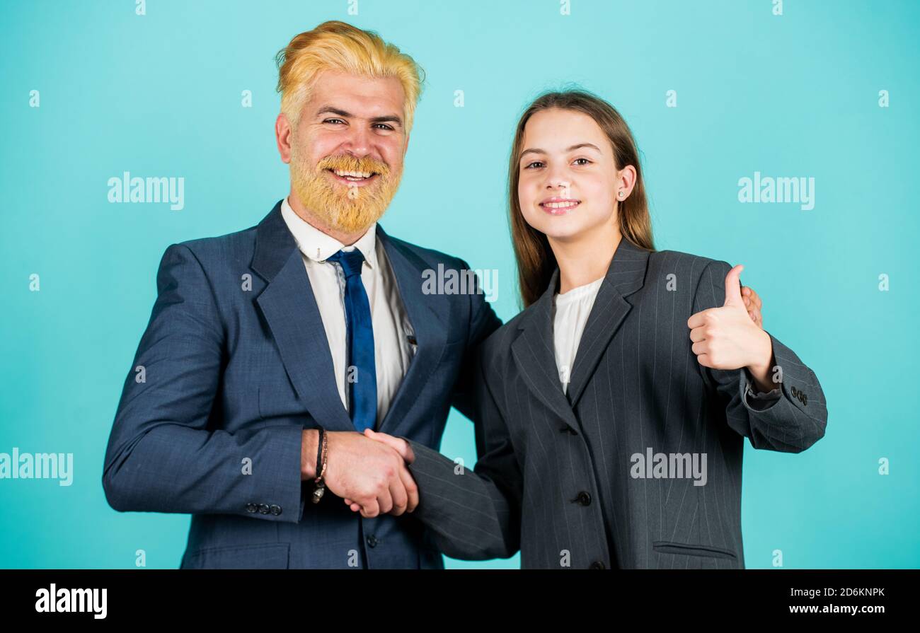 winning. small girl in oversized suit jacket. future career. family ...