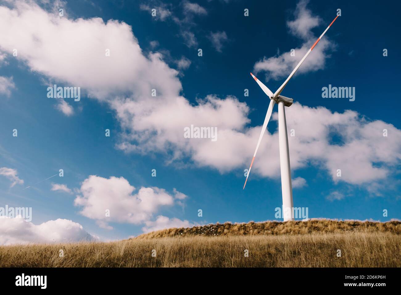 wind turbine with clouds and sky Stock Photo - Alamy