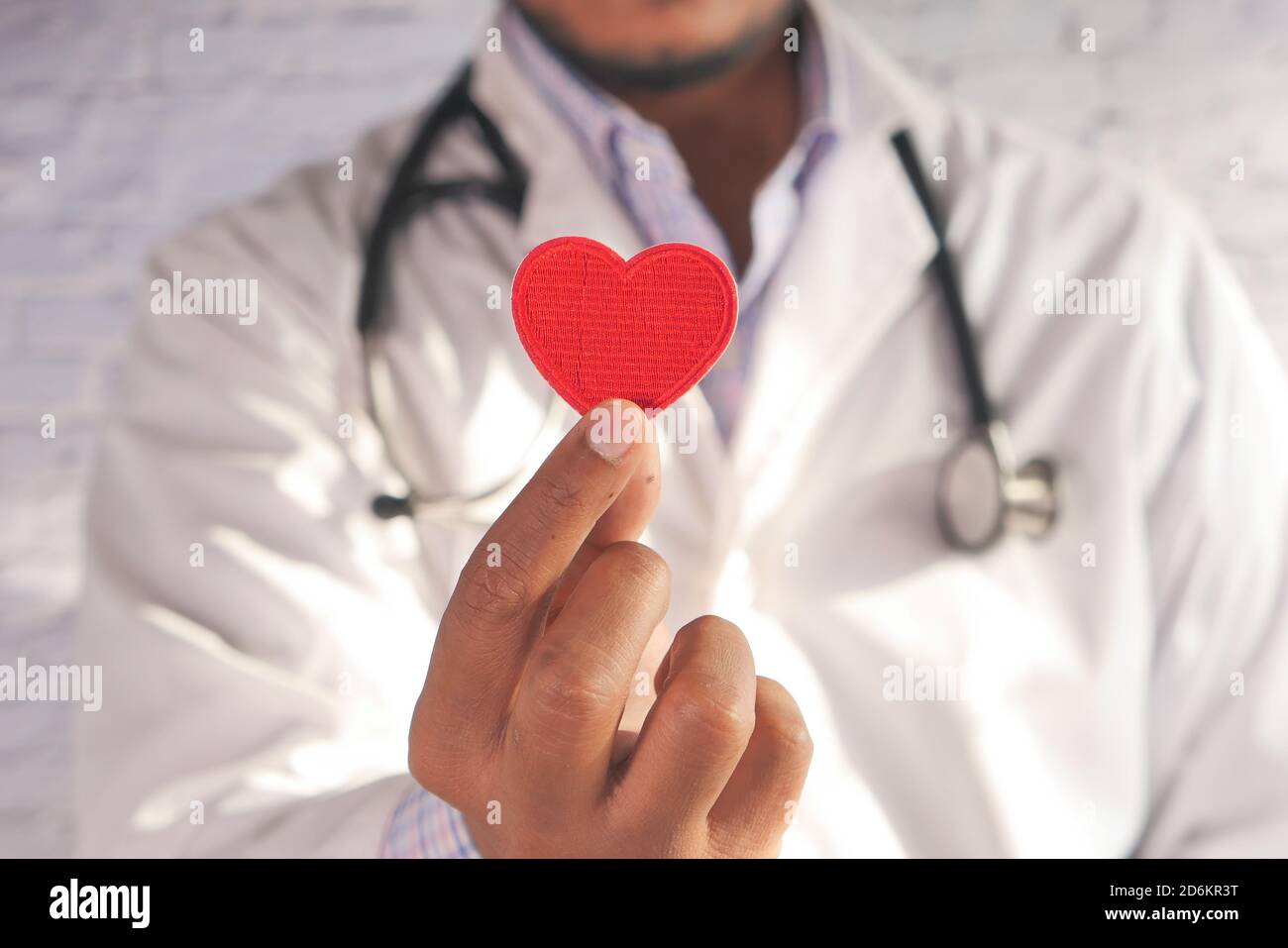doctor hand with heart close up Stock Photo - Alamy