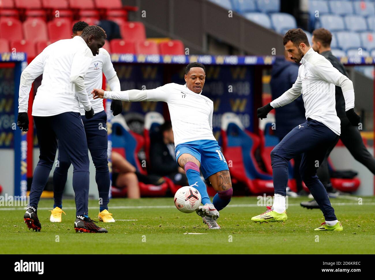 Crystal Palace's Nathaniel Clyne (centre) warming up before the Premier ...