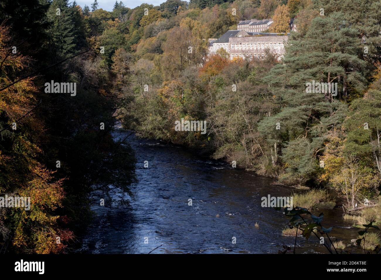 River Clyde and converted old mill buildings at New Lanark conservation ...