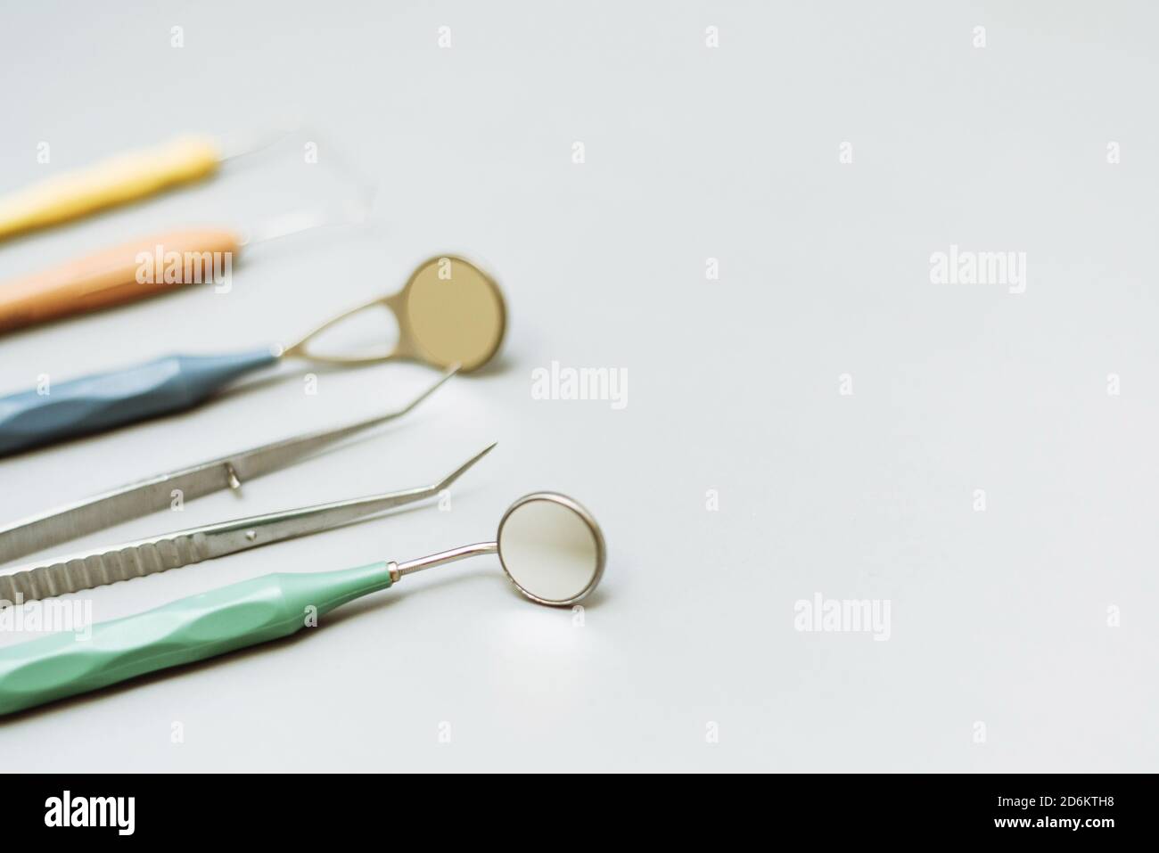 Dentist tools on a gray background. Modern instruments for dental ...