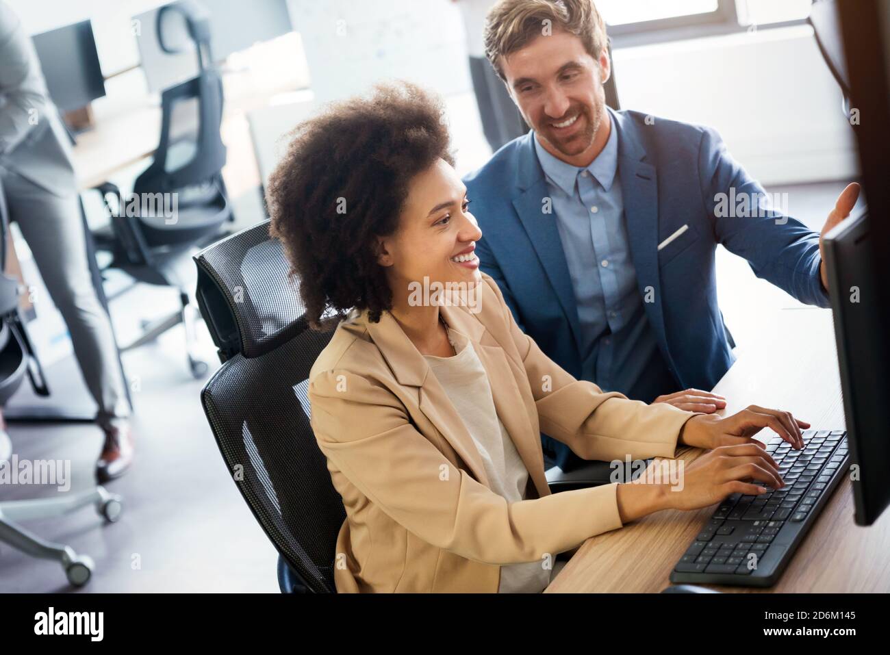 Programmer working in a software developing company Stock Photo - Alamy