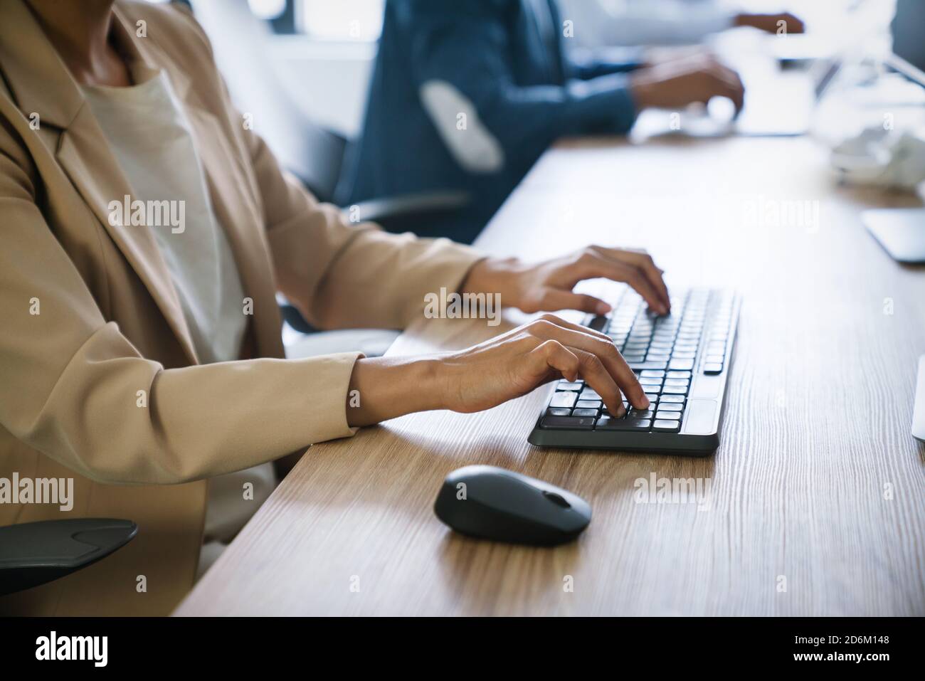 Creative people working in office on computer Stock Photo - Alamy